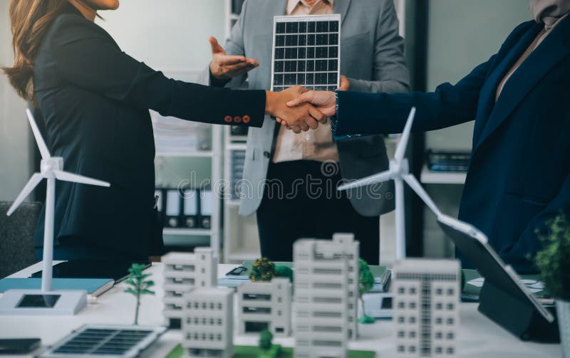 Two Business Executives, Elegantly Attired in Suits, Join Hands in a ...
