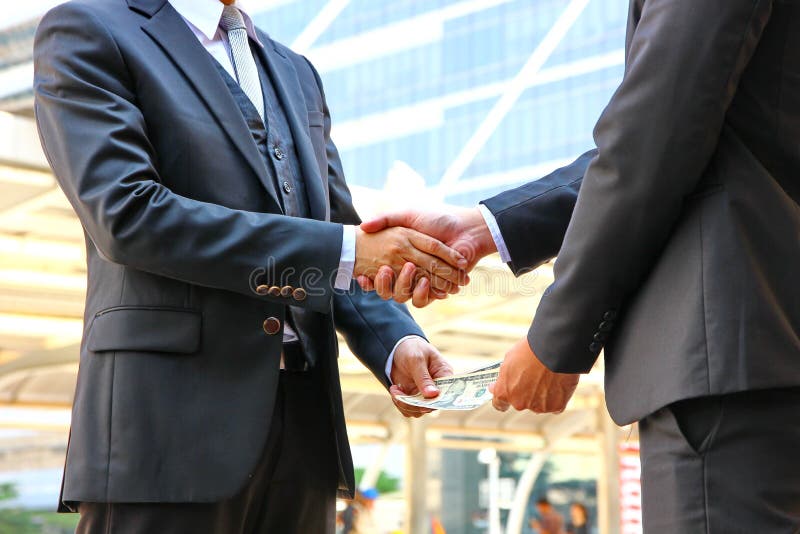 Two Business Men Change Benefit Hand To Hand Stock Photo - Image of ...