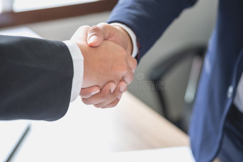 Two Business Men Shake Hands for Business Cooperation Stock Photo ...