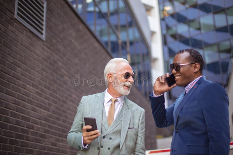 Two Business Men Talking on the Street. Stock Photo - Image of business ...