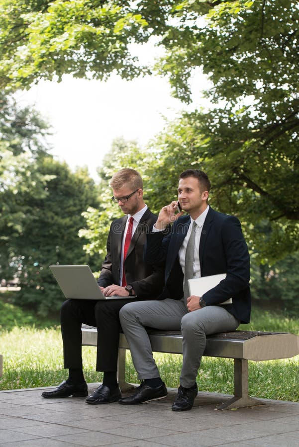 Two Business Men Working on a Computer Stock Photo - Image of happiness ...