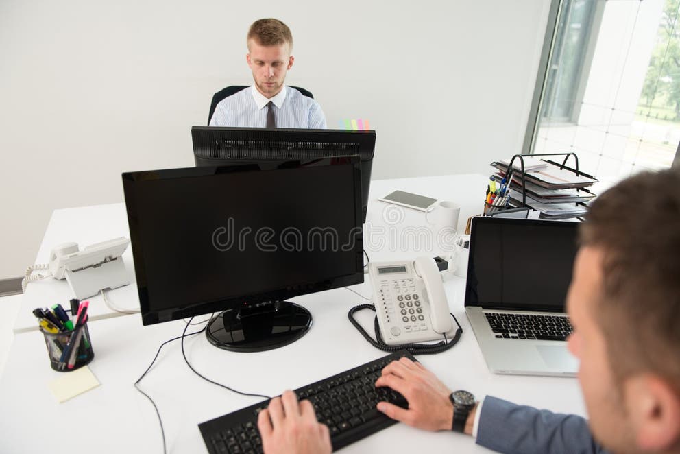 Two Business Men Working on a Computer Stock Photo - Image of computer ...