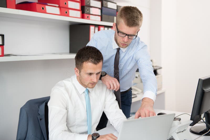 Two Business Men Working on a Computer Stock Image - Image of business ...