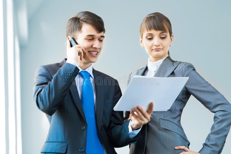 Two Business Partners Discussing Reports Stock Image - Image of ...