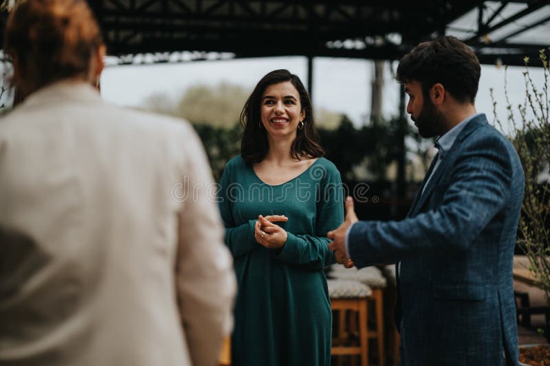 Business Partners Conversing Outdoors with a Handshake Stock Image ...