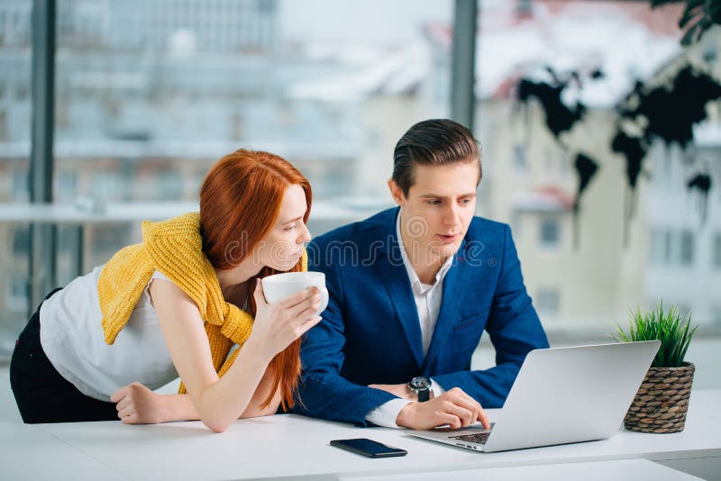 Two Business Partners Working with Laptop Together. Stock Image - Image ...