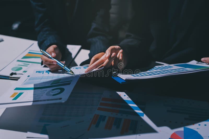Two Business People Analyzing the Data Stock Photo - Image of adults ...
