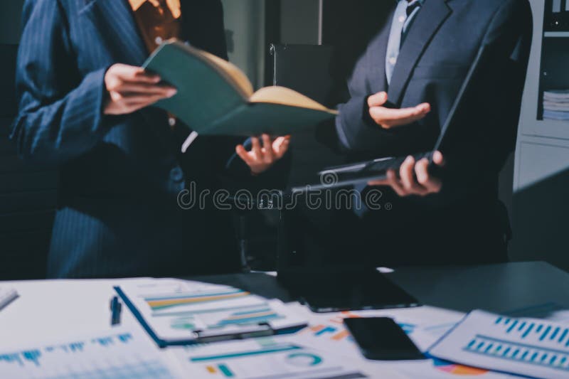 Two Business People Analyzing the Data Stock Photo - Image of adults ...