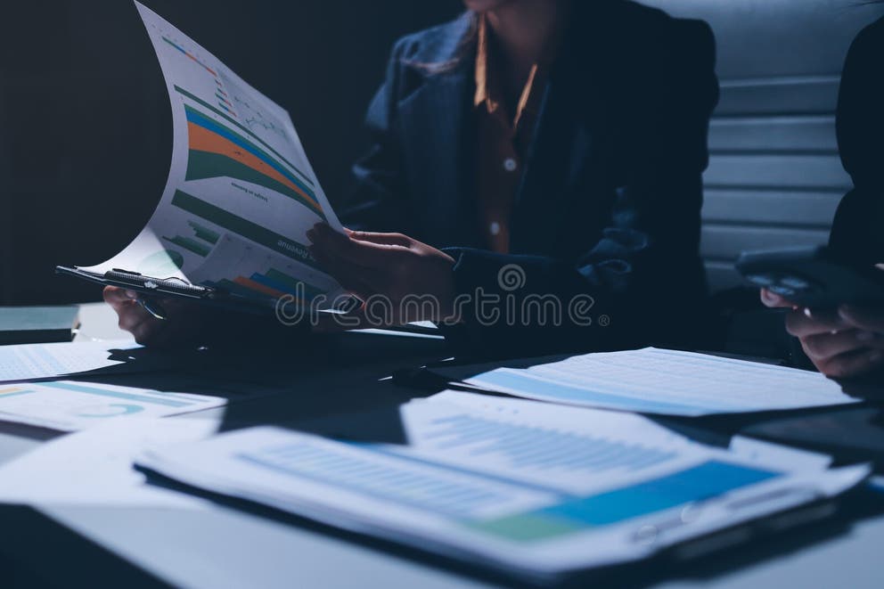 Two Business People Analyzing the Data Stock Photo - Image of ...
