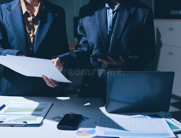 Two Business People Analyzing the Data Stock Image - Image of desk ...
