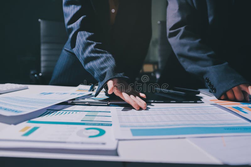 Two Business People Analyzing the Data Stock Photo - Image of adults ...
