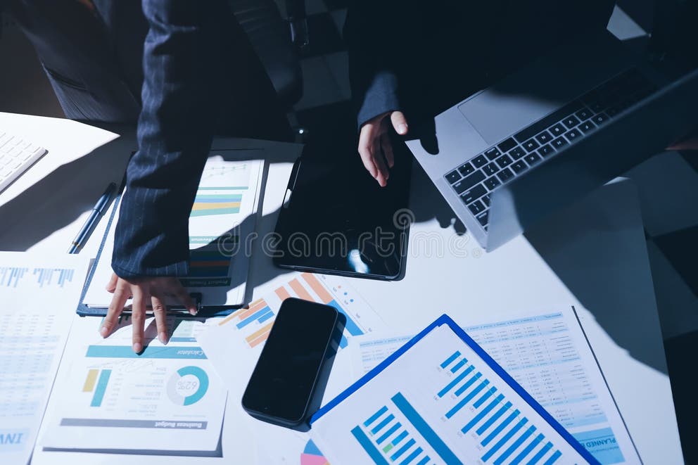 Two Business People Analyzing the Data Stock Image - Image of document ...