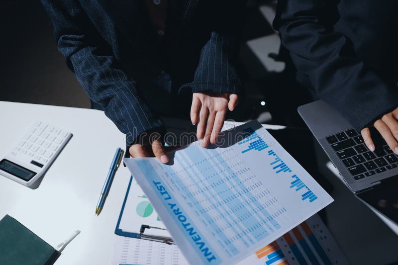 Two Business People Analyzing the Data Stock Image - Image of analyzing ...