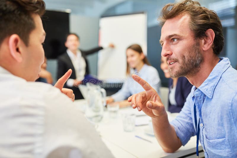 Two Business People Argue and Discuss Stock Image - Image of ...