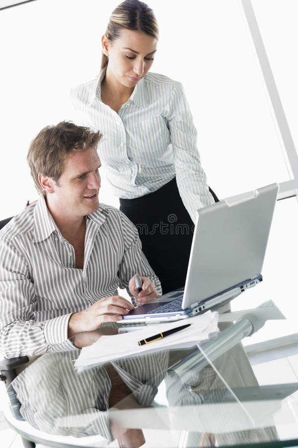 Two Business People in Boardroom with Laptop Stock Photo - Image of ...