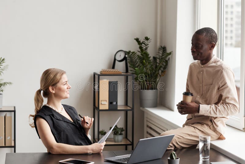 Two Business People on Break in Office Stock Image - Image of ...