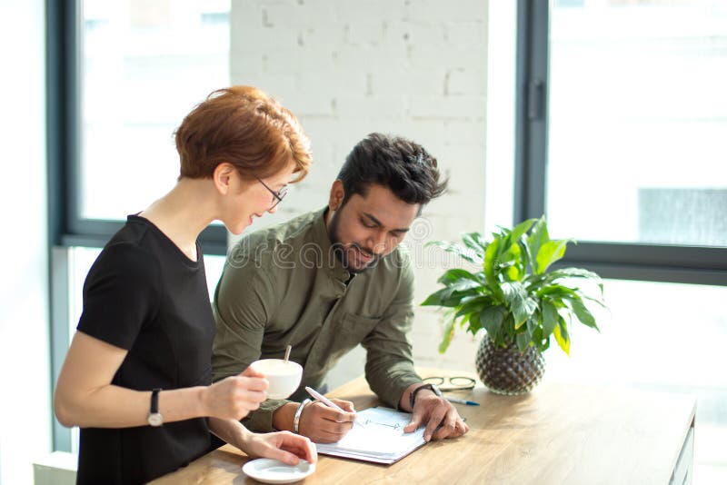 Two men discuss on meeting stock image. Image of paper - 63076719