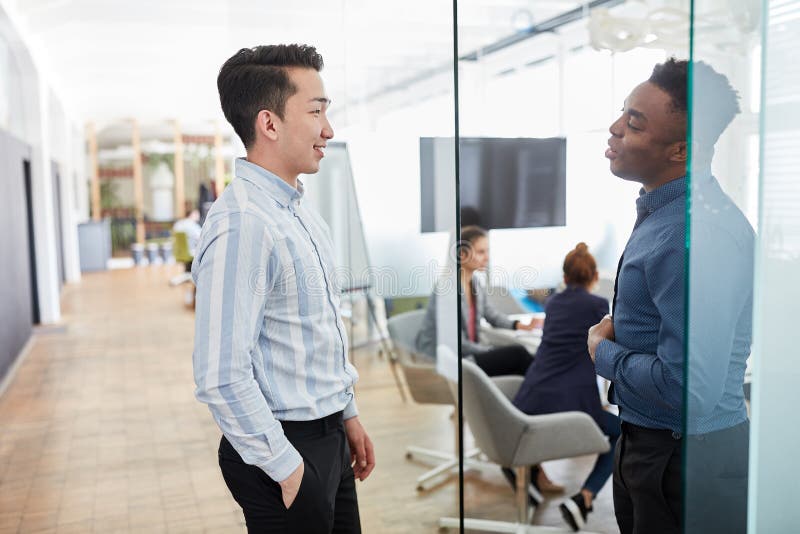 Two Business People are Discussing with Each Other Stock Photo - Image ...