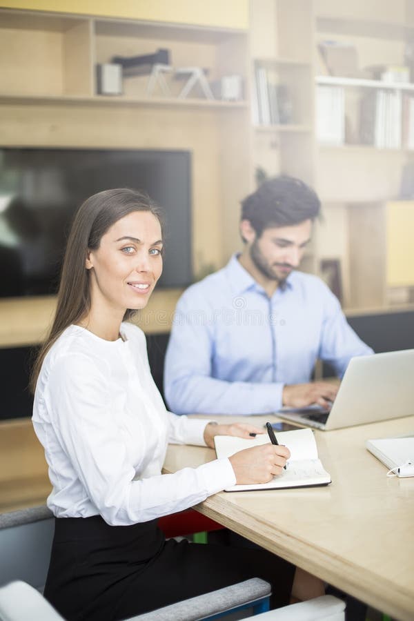 Two Business People Discussing New Project in Modern Office Stock Photo ...