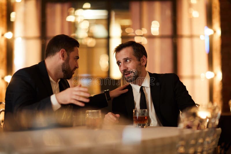 Two Business People Drinking in Restaurant Stock Photo - Image of ...