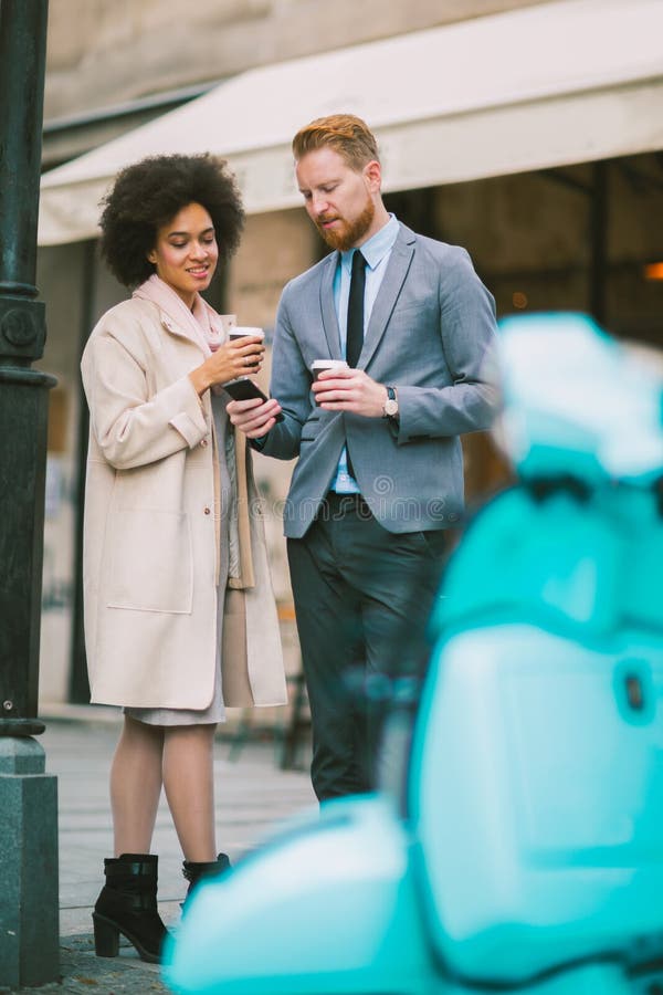 Two Business People in an Informal Conversation Stock Photo - Image of ...