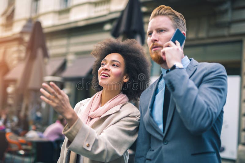 Two Business People in an Informal Conversation Stock Photo - Image of ...