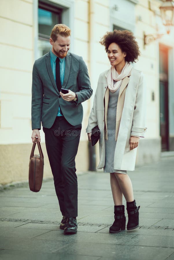 Two Business People in an Informal Conversation Stock Photo - Image of ...