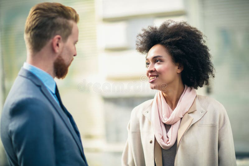 Two Business People in an Informal Conversation Stock Image - Image of ...