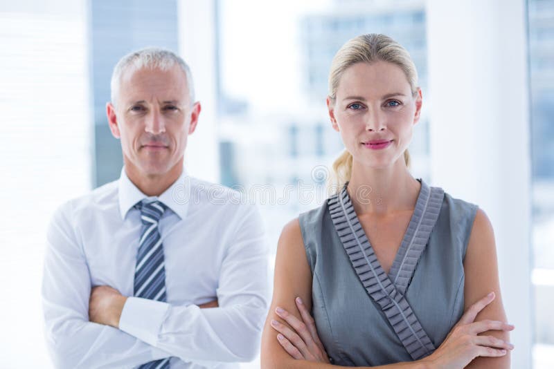 Two Business People Looking at the Camera Stock Image - Image of ...