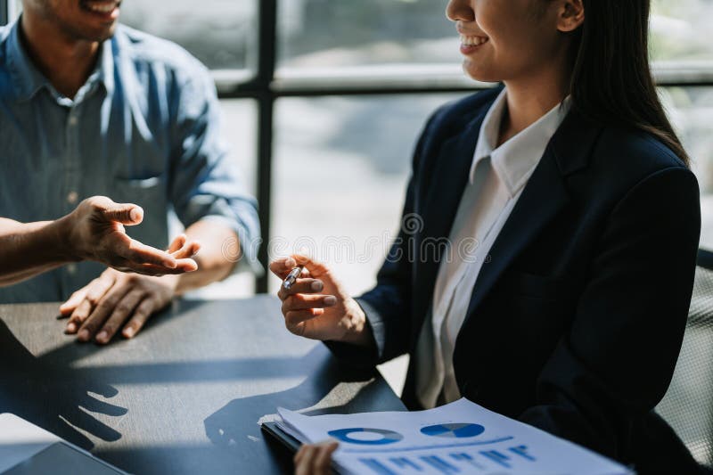 Two Business People Meeting To Talking or Discuss Marketing Work in ...