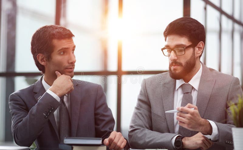 Two Business People in the Office at the Table Stock Photo - Image of ...
