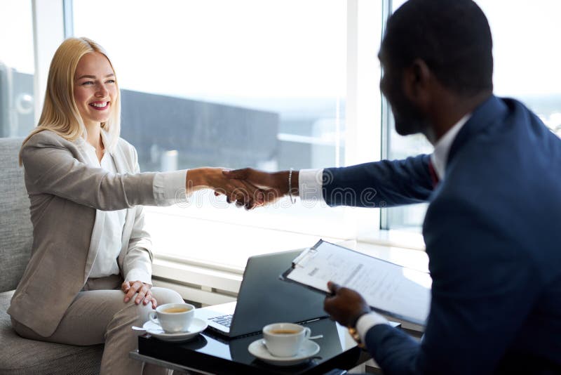 Two Business People Shaking Hands Stock Image - Image of caucasian ... Two Business People Shaking Hands Stock Image - Image of caucasian ...