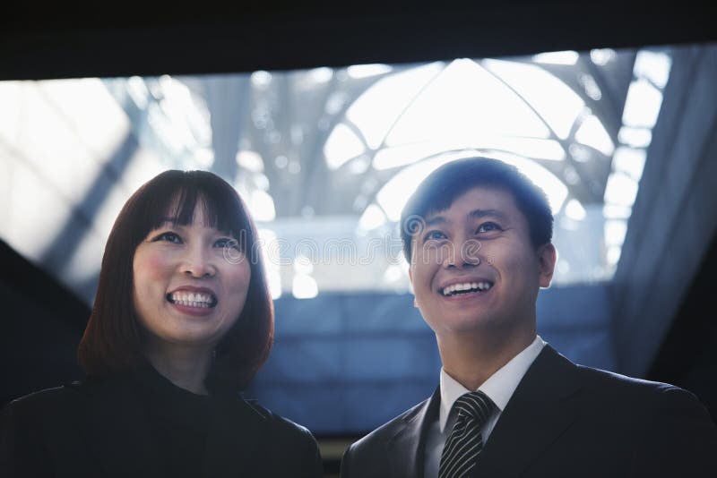 Two Business People Smiling Together, Portrait, Beijing Stock Photo ...