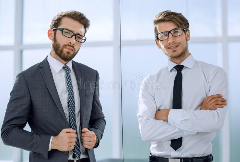 Two Business People Standing in the Office Stock Image - Image of ...