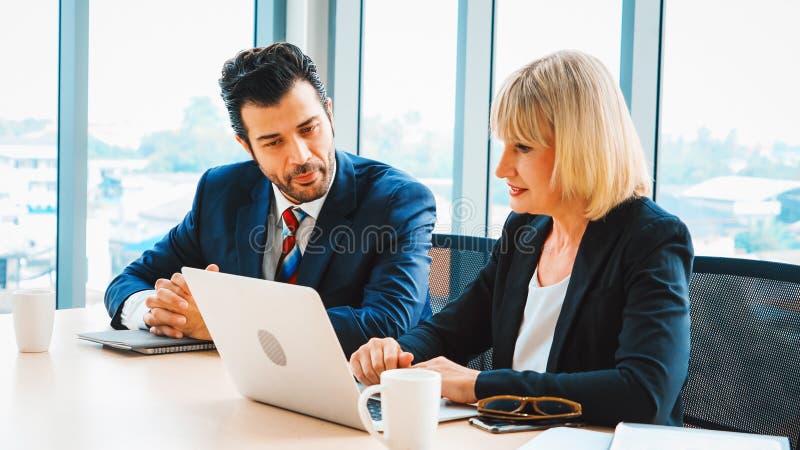 Two Business People Talk Project Strategy at Office Jivy Stock Photo ...