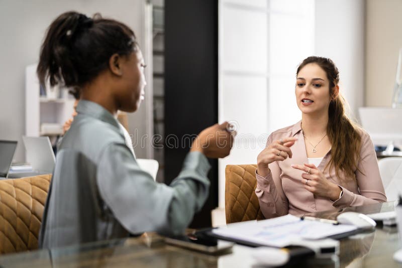 Two Business People Talking Stock Photo - Image of mobile, planning ...