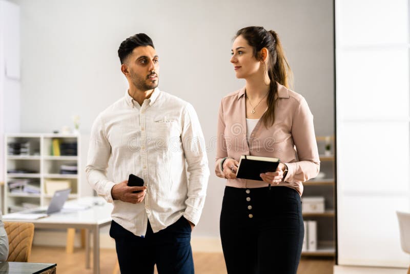 Two Business People Talking Stock Photo - Image of business ...