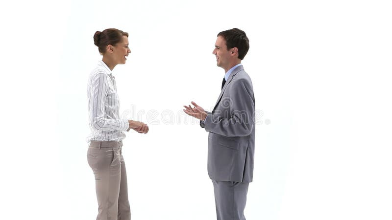 Two People Talking in Front of Microphones and Sitting at Table during ...