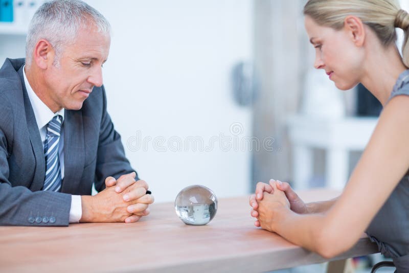 Two Business People Thinking with a Crystal Ball Stock Image - Image of ...