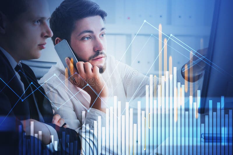 Two Business People Traders Working Together in Front of Desktop Stock ...