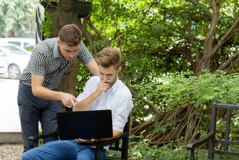 Two Business People Use of the Notebook Computer Stock Image - Image of ...