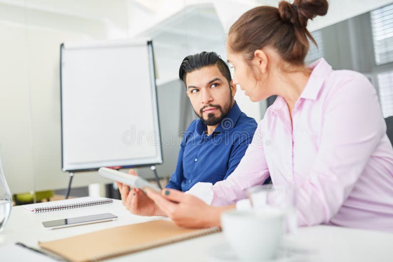 Two Business People Work Together As a Team in the Office Stock Photo ...
