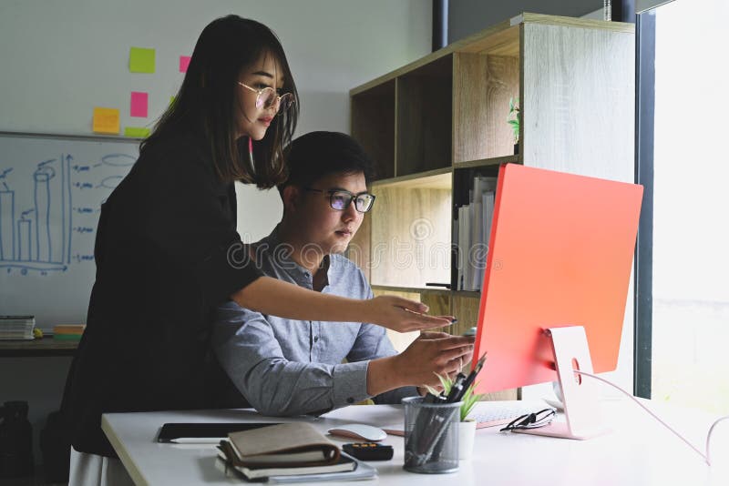 Business People Working Together with Computer at Office. Stock Image ...