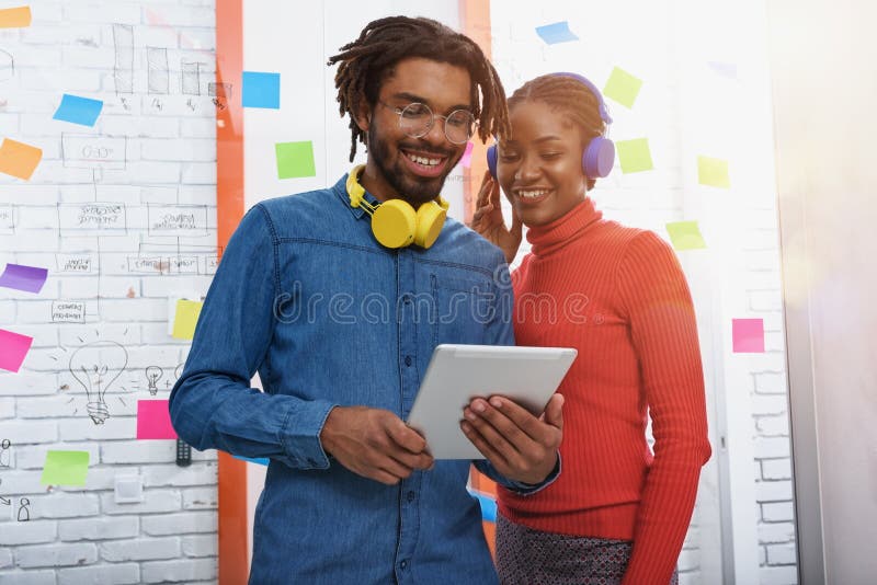 Two Business Person Work Together in Office with a Tablet Stock Image ...