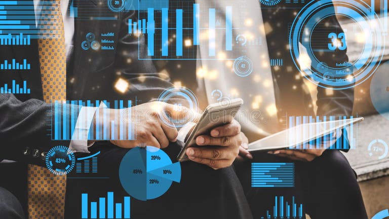 Business Professionals Analyzing Digital Data Charts and Graphs on ...