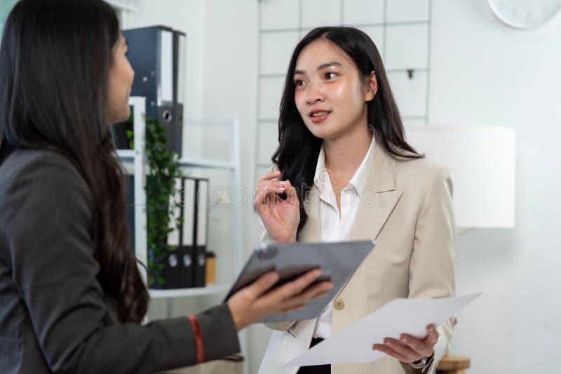 Effective Communication in Business. Professionals Discussing Project Details in a Meeting ...