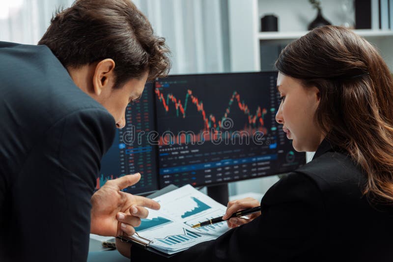 Two Business Traders Discussing Business Statistic on Report Paper ...