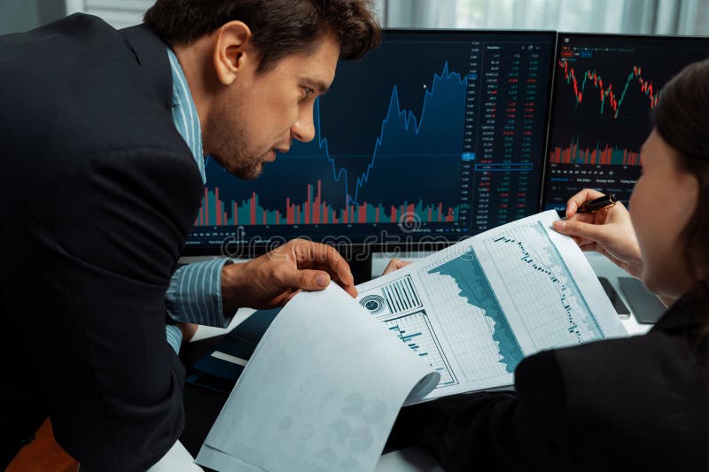 Two Business Traders Discussing Business Statistic on Report Paper ...