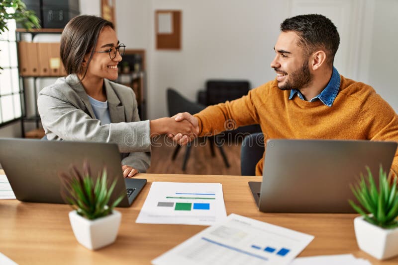 Two Business Workers Shaking Hands at the Office Stock Photo - Image of ...