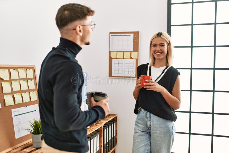 Two Business Workers Smiling Happy Drinking Coffee at the Office Stock ...